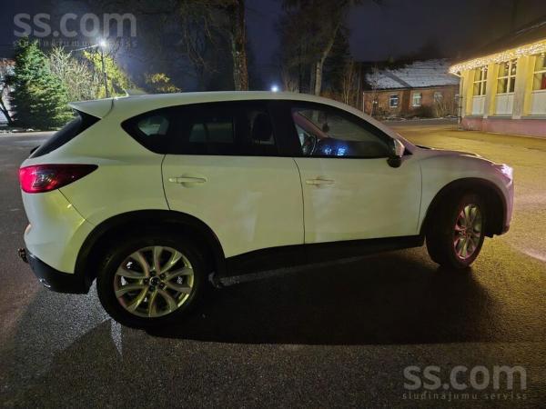 White Mazda CX-5 2013 in Liepaja, with an engine capacity of 2.20 L and mileage of 203 thousand km for 6150 €, photo 7 on AUTOMOTO.COM.LV