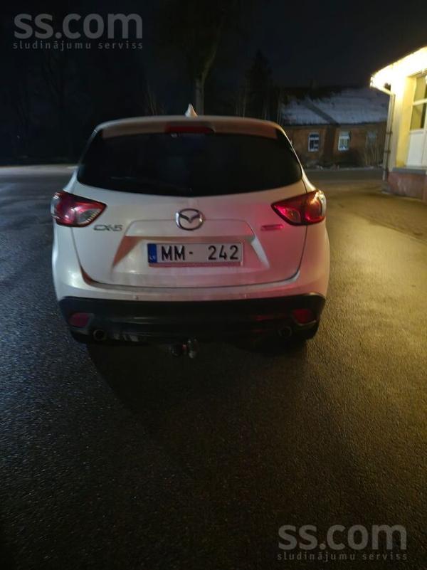 White Mazda CX-5 2013 in Liepaja, with an engine capacity of 2.20 L and mileage of 203 thousand km for 6150 €, photo 8 on AUTOMOTO.COM.LV