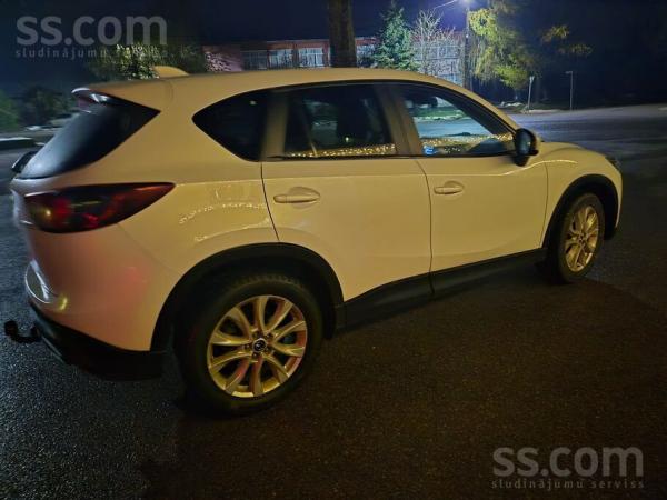 White Mazda CX-5 2013 in Liepaja, with an engine capacity of 2.20 L and mileage of 203 thousand km for 6150 €, photo 9 on AUTOMOTO.COM.LV