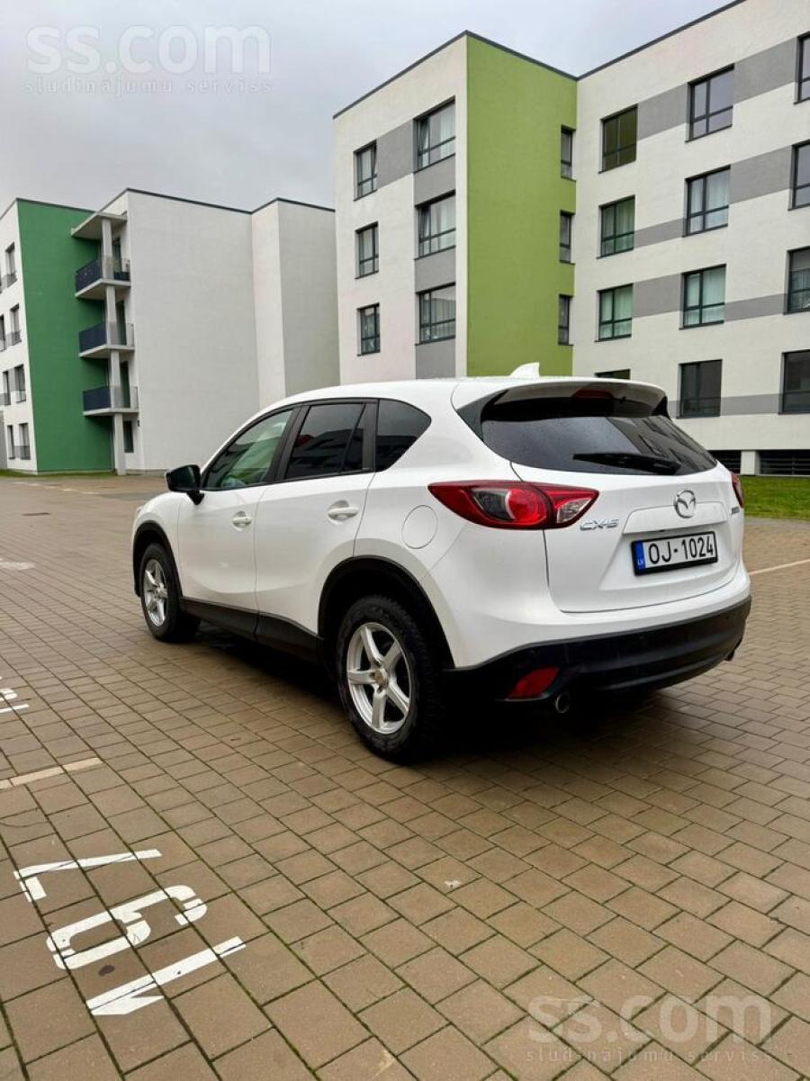 White Mazda CX-5 2013 in Riga, with an engine capacity of 2.20 L and mileage of 213 thousand km for 7400 €, photo 4 on AUTOMOTO.COM.LV