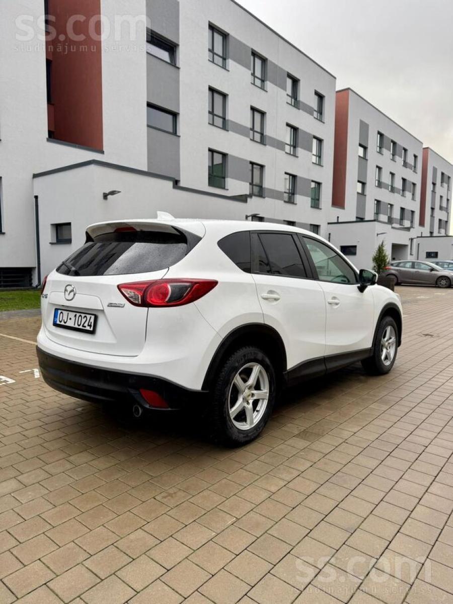 White Mazda CX-5 2013 in Riga, with an engine capacity of 2.20 L and mileage of 213 thousand km for 7400 €, photo 7 on AUTOMOTO.COM.LV