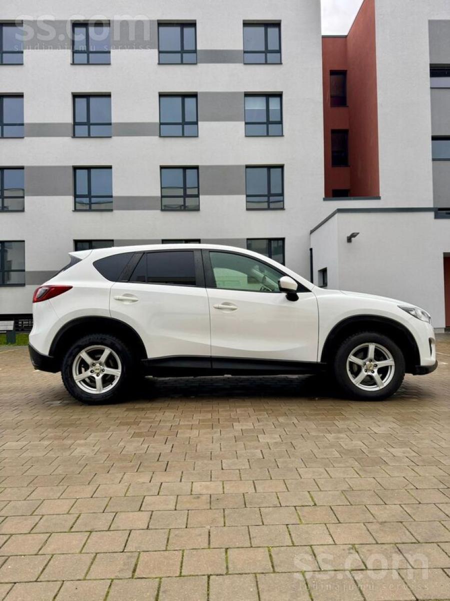 White Mazda CX-5 2013 in Riga, with an engine capacity of 2.20 L and mileage of 213 thousand km for 7400 €, photo 8 on AUTOMOTO.COM.LV