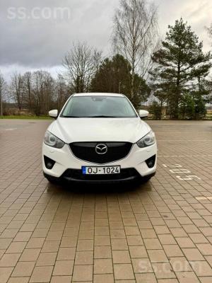 White Mazda CX-5 2013 in Riga, with an engine capacity of 2.20 L and mileage of 213 thousand km for 7400 €, photo 11 on AUTOMOTO.COM.LV