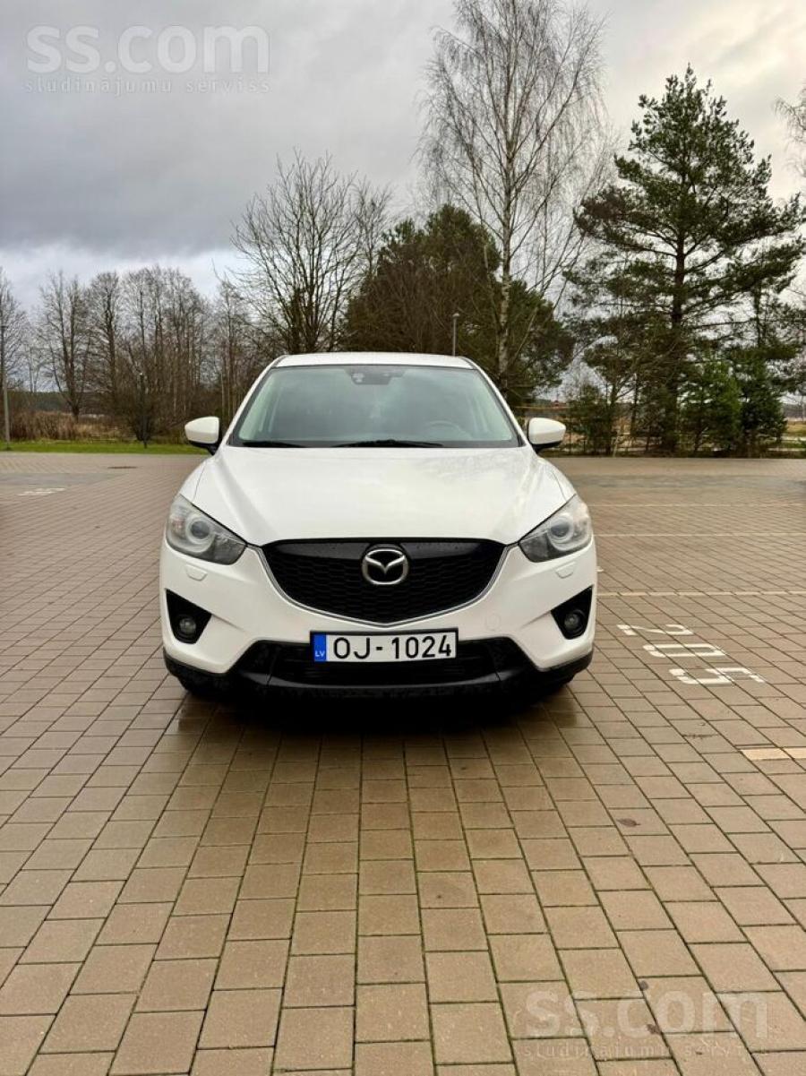 White Mazda CX-5 2013 in Riga, with an engine capacity of 2.20 L and mileage of 213 thousand km for 7400 €, photo 11 on AUTOMOTO.COM.LV