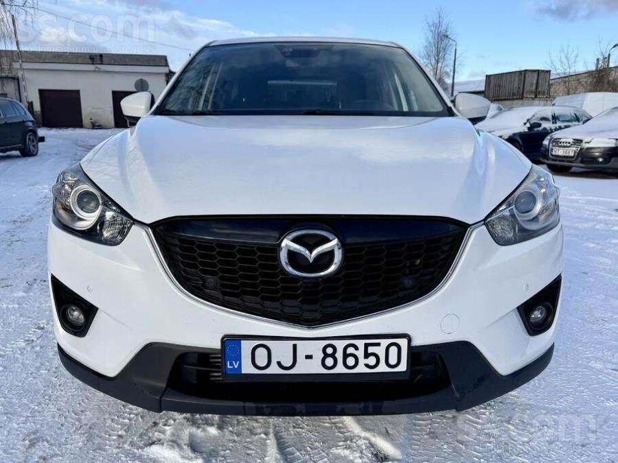 White Mazda CX-5 2013 in Riga, with an engine capacity of 2.20 L and mileage of 0 thousand km for 6990 €, photo 5 on AUTOMOTO.COM.LV