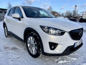 White Mazda CX-5 2013 in Riga, with an engine capacity of 2.20 L and mileage of 0 thousand km for 6990 €, photo 6 on AUTOMOTO.COM.LV