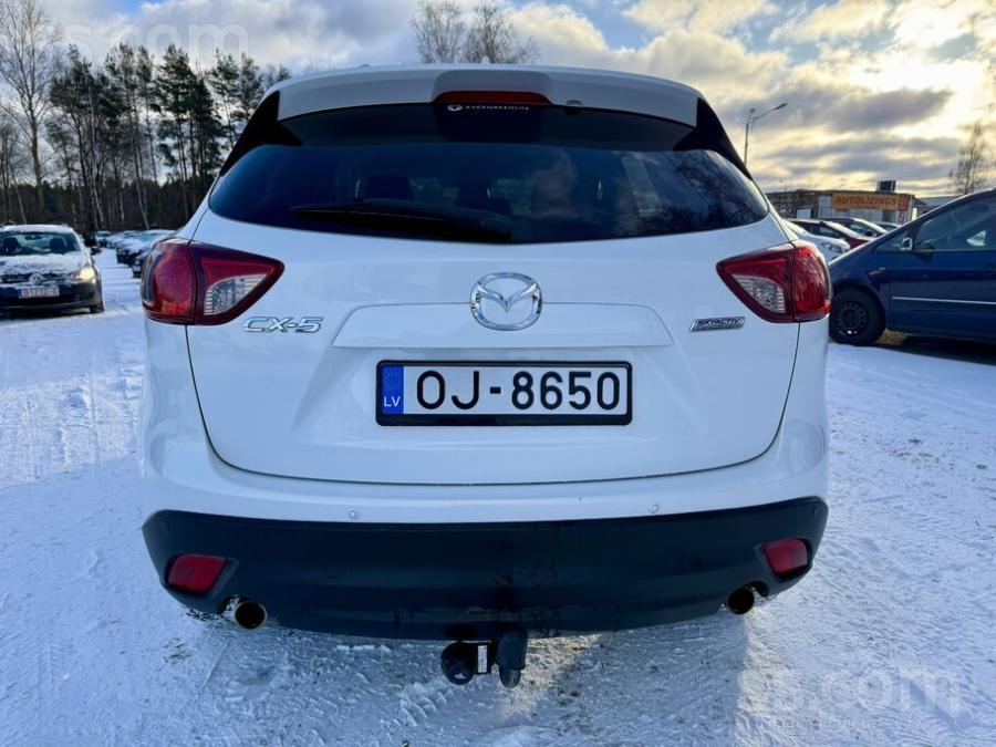 White Mazda CX-5 2013 in Riga, with an engine capacity of 2.20 L and mileage of 0 thousand km for 6990 €, photo 10 on AUTOMOTO.COM.LV