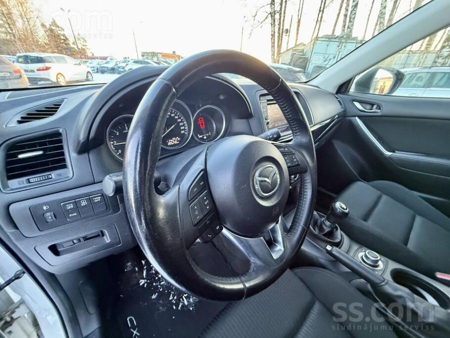 White Mazda CX-5 2013 in Riga, with an engine capacity of 2.20 L and mileage of 0 thousand km for 6990 €, photo 15 on AUTOMOTO.COM.LV