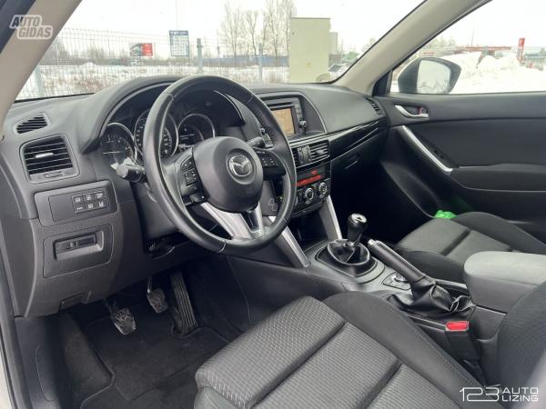 White Mazda CX-5 2013 in Taurage, with an engine capacity of 2.20 L and mileage of 228 thousand km for 6200 €, photo 10 on AUTOMOTO.COM.LV