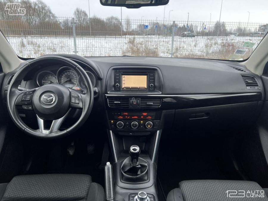 White Mazda CX-5 2013 in Taurage, with an engine capacity of 2.20 L and mileage of 228 thousand km for 6200 €, photo 13 on AUTOMOTO.COM.LV