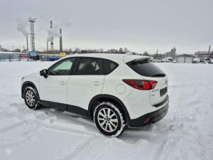 White Mazda CX-5 2013 in Panevezys, with an engine capacity of 2.19 L and mileage of 170 thousand km for 5200 €, photo 4 on AUTOMOTO.COM.LV