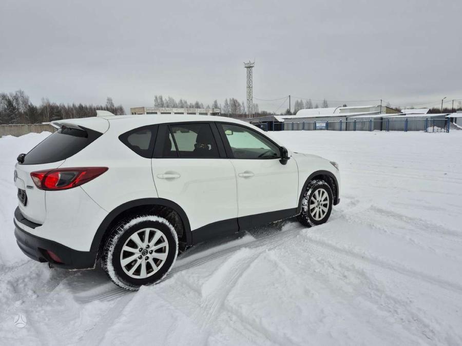 White Mazda CX-5 2013 in Panevezys, with an engine capacity of 2.19 L and mileage of 170 thousand km for 5200 €, photo 5 on AUTOMOTO.COM.LV