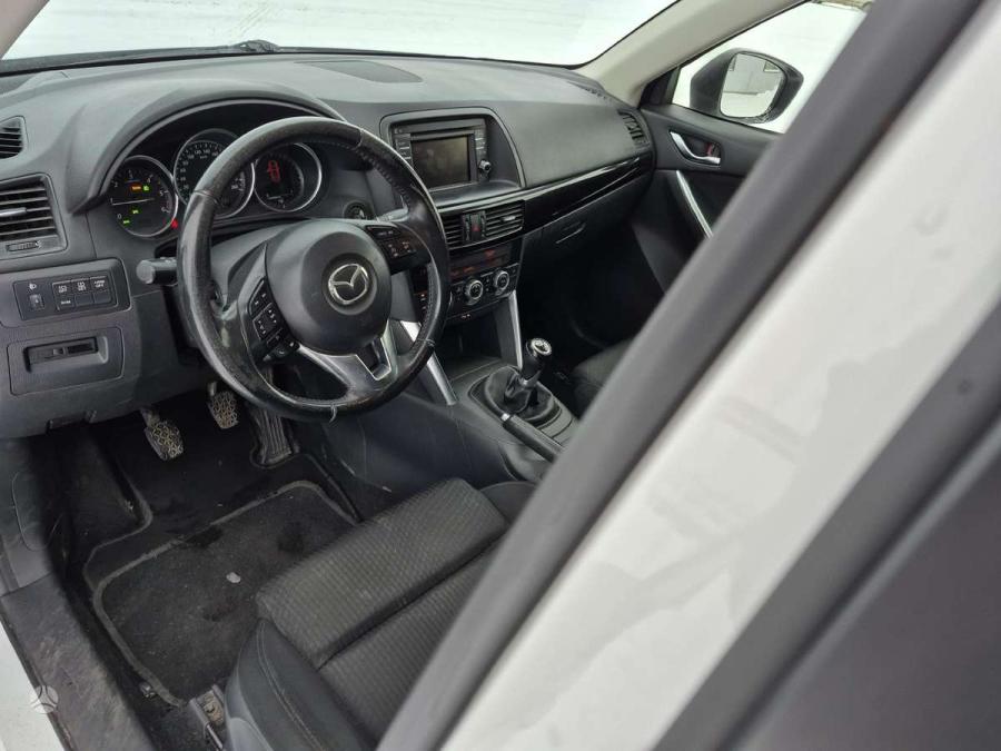 White Mazda CX-5 2013 in Panevezys, with an engine capacity of 2.19 L and mileage of 170 thousand km for 5200 €, photo 8 on AUTOMOTO.COM.LV