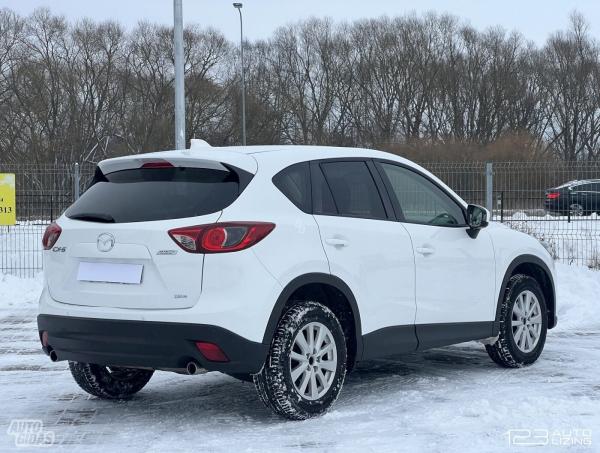 White Mazda CX-5 2013 in Taurage, with an engine capacity of 2.20 L and mileage of 228 thousand km for 5700 €, photo 6 on AUTOMOTO.COM.LV