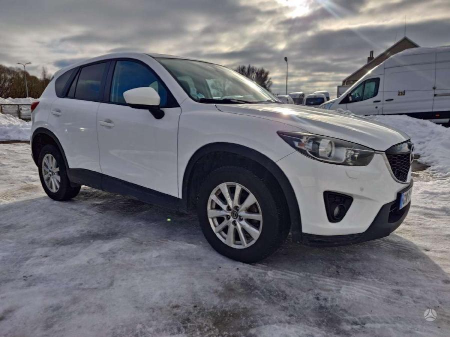 White Mazda CX-5 2013 in Taurage, with an engine capacity of 2.19 L and mileage of 141 thousand km for 5898 €, photo 4 on AUTOMOTO.COM.LV