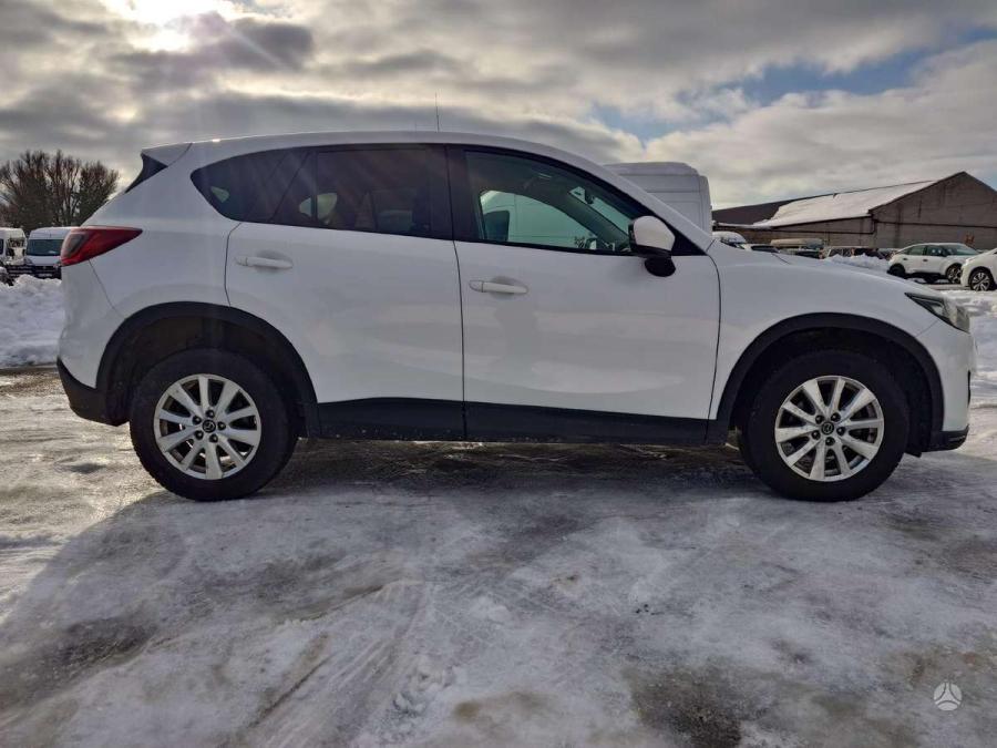 White Mazda CX-5 2013 in Taurage, with an engine capacity of 2.19 L and mileage of 141 thousand km for 5898 €, photo 5 on AUTOMOTO.COM.LV