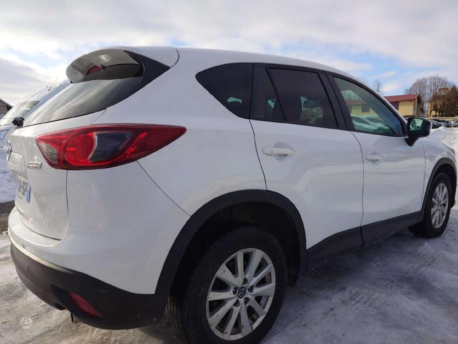 White Mazda CX-5 2013 in Taurage, with an engine capacity of 2.19 L and mileage of 141 thousand km for 5898 €, photo 6 on AUTOMOTO.COM.LV