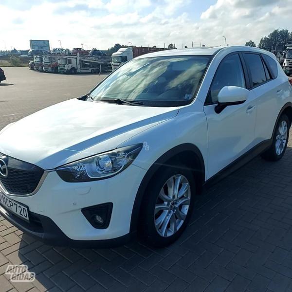 White Mazda CX-5 2013 in Jurbarkas, with an engine capacity of 2.20 L and mileage of 205 thousand km for 7500 €, photo 3 on AUTOMOTO.COM.LV