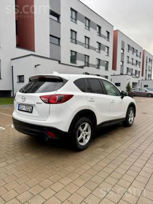 White Mazda CX-5 2013 in Riga, with an engine capacity of 2.20 L and mileage of 213 thousand km for 7399 €, photo 7 on AUTOMOTO.COM.LV