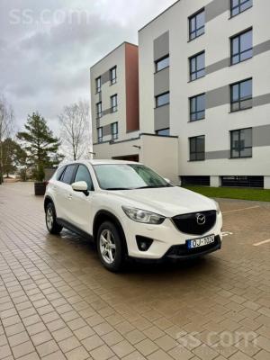 White Mazda CX-5 2013 in Riga, with an engine capacity of 2.20 L and mileage of 213 thousand km for 7399 €, photo 8 on AUTOMOTO.COM.LV