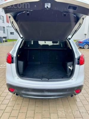 White Mazda CX-5 2013 in Riga, with an engine capacity of 2.20 L and mileage of 213 thousand km for 7399 €, photo 10 on AUTOMOTO.COM.LV