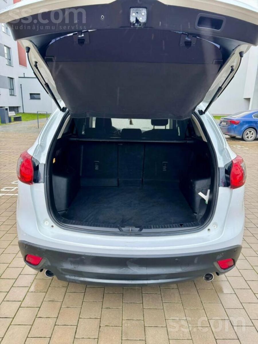 White Mazda CX-5 2013 in Riga, with an engine capacity of 2.20 L and mileage of 213 thousand km for 7399 €, photo 10 on AUTOMOTO.COM.LV