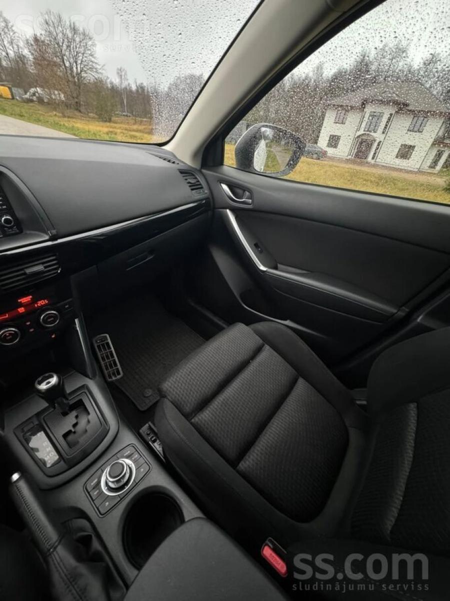White Mazda CX-5 2013 in Riga, with an engine capacity of 2.20 L and mileage of 213 thousand km for 7399 €, photo 12 on AUTOMOTO.COM.LV