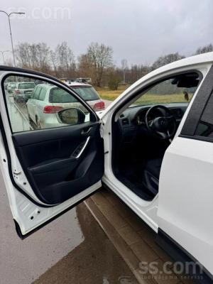White Mazda CX-5 2013 in Riga, with an engine capacity of 2.20 L and mileage of 213 thousand km for 7399 €, photo 13 on AUTOMOTO.COM.LV