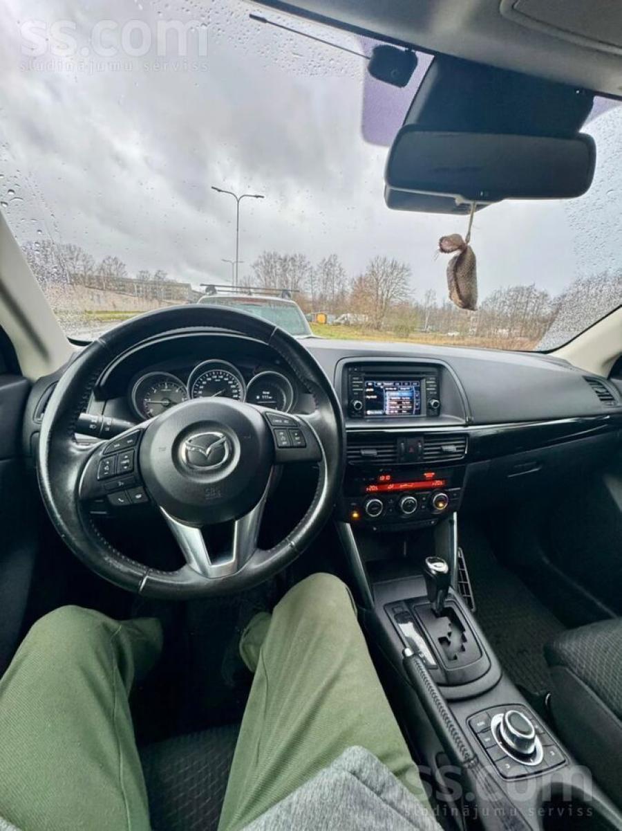 White Mazda CX-5 2013 in Riga, with an engine capacity of 2.20 L and mileage of 213 thousand km for 7399 €, photo 15 on AUTOMOTO.COM.LV
