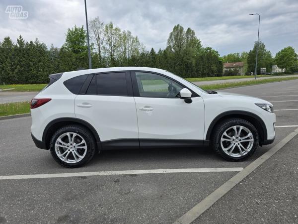 White Mazda CX-5 2013 in Panevezys, with an engine capacity of 2.20 L and mileage of 273 thousand km for 7500 €, photo 3 on AUTOMOTO.COM.LV