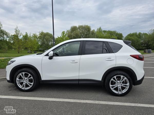 White Mazda CX-5 2013 in Panevezys, with an engine capacity of 2.20 L and mileage of 273 thousand km for 7500 €, photo 4 on AUTOMOTO.COM.LV