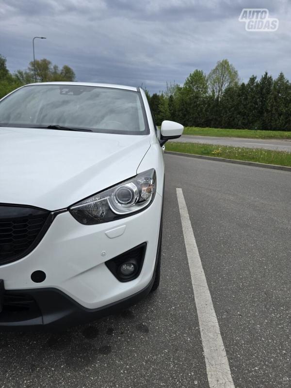 White Mazda CX-5 2013 in Panevezys, with an engine capacity of 2.20 L and mileage of 273 thousand km for 7500 €, photo 8 on AUTOMOTO.COM.LV
