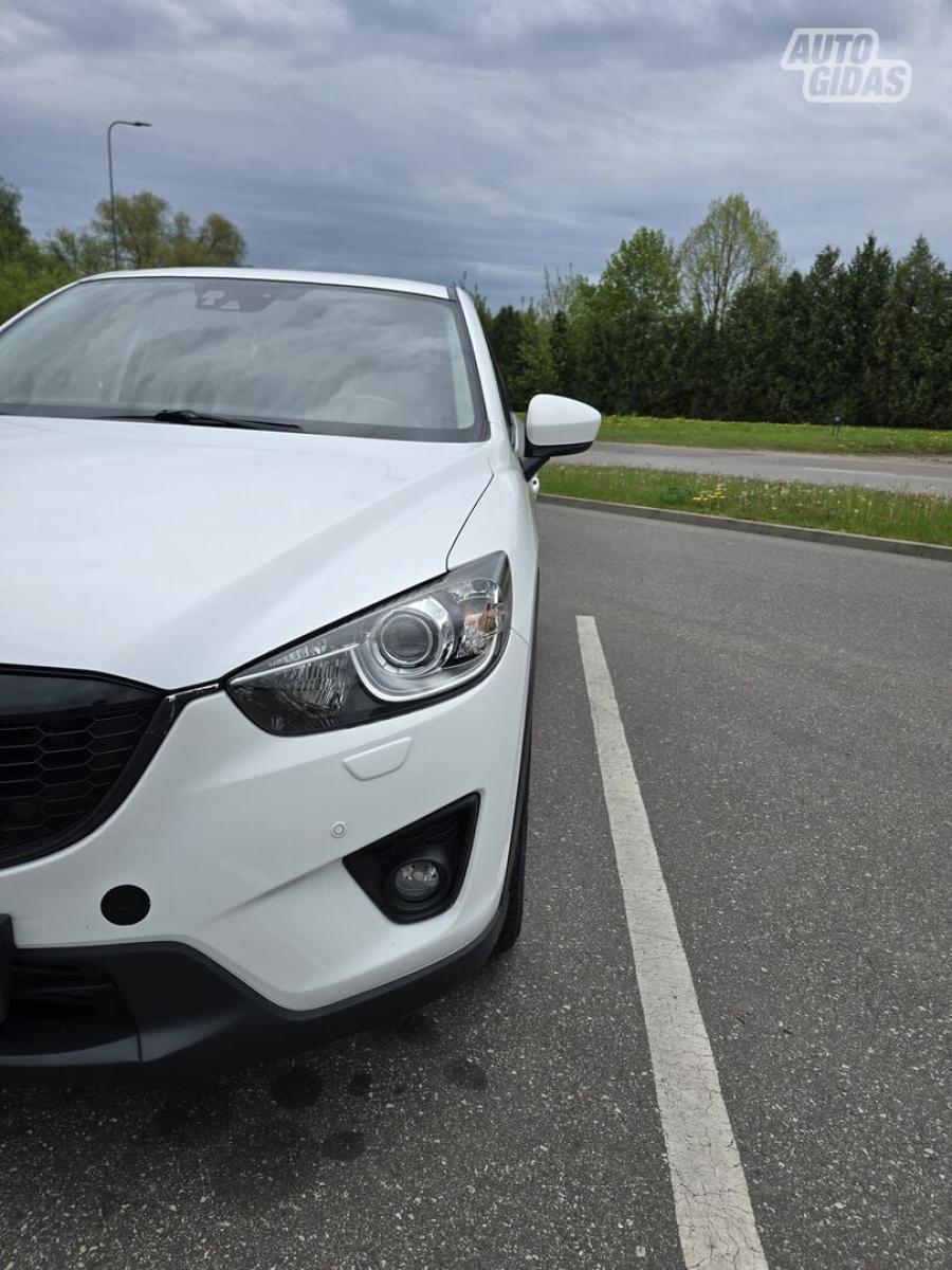 Balts Mazda CX-5 2013 Panevēža, ar dzinēja tilpumu 2.20 L un nobraukumu 273 tūkst. km par 7500 €, foto 9 vietnē AUTOMOTO.COM.LV