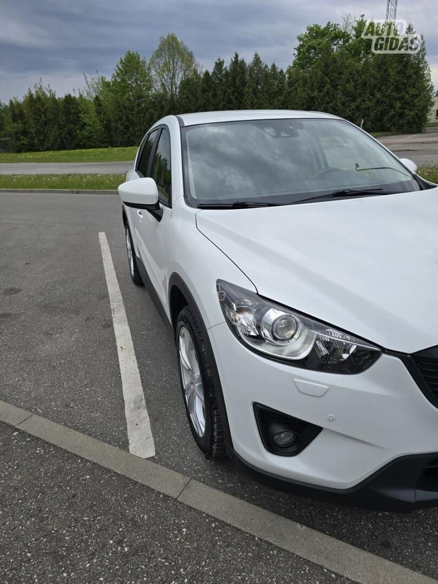 Balts Mazda CX-5 2013 Panevēža, ar dzinēja tilpumu 2.20 L un nobraukumu 273 tūkst. km par 7500 €, foto 15 vietnē AUTOMOTO.COM.LV