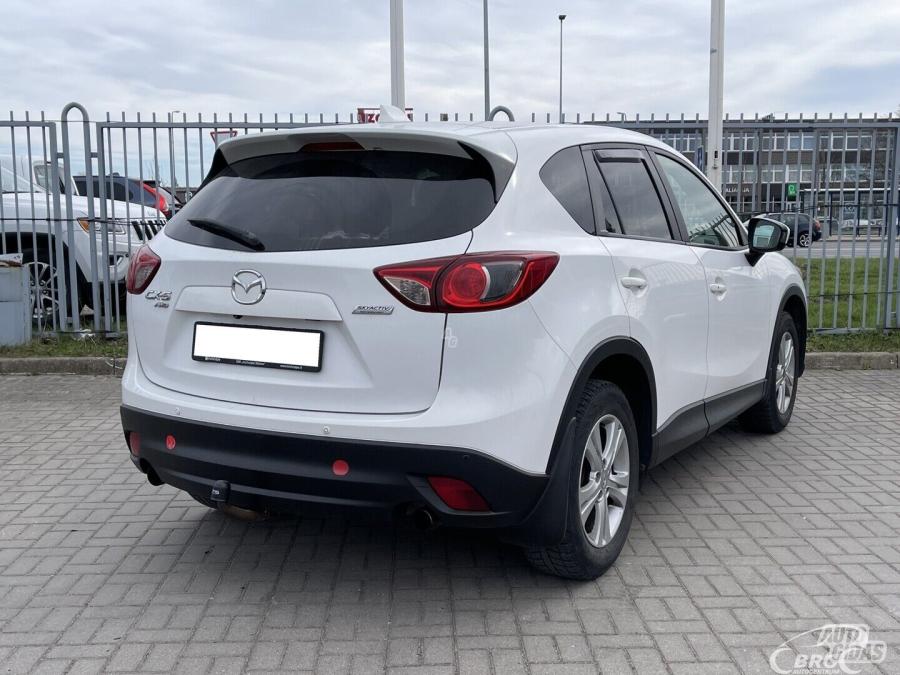 White Mazda CX-5 2013 in Avizieniai, with an engine capacity of 2.20 L and mileage of 224 thousand km for 6900 €, photo 3 on AUTOMOTO.COM.LV