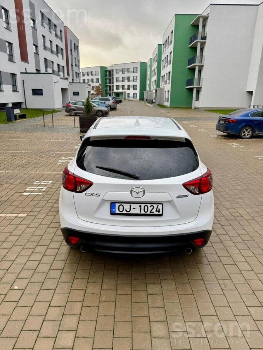 Balts Mazda CX-5 2013 Rīga, ar dzinēja tilpumu 2.20 L un nobraukumu 213 tūkst. km par 7199 €, foto 7 vietnē AUTOMOTO.COM.LV