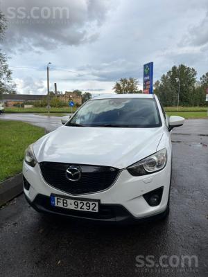 Balts Mazda CX-5 2013 Rīga, ar dzinēja tilpumu 2.00 L un nobraukumu 177 tūkst. km par 8600 €, foto  vietnē AUTOMOTO.COM.LV