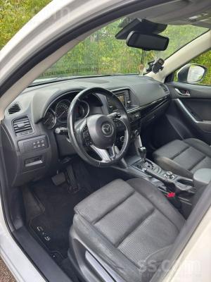 White Mazda CX-5 2013 in Riga, with an engine capacity of 2.00 L and mileage of 177 thousand km for 8600 €, photo 4 on AUTOMOTO.COM.LV