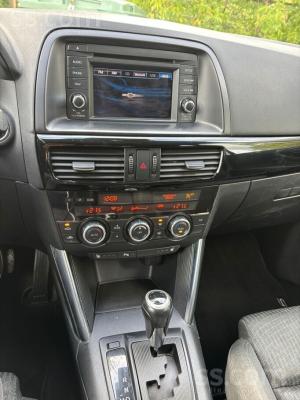 White Mazda CX-5 2013 in Riga, with an engine capacity of 2.00 L and mileage of 177 thousand km for 8600 €, photo 5 on AUTOMOTO.COM.LV