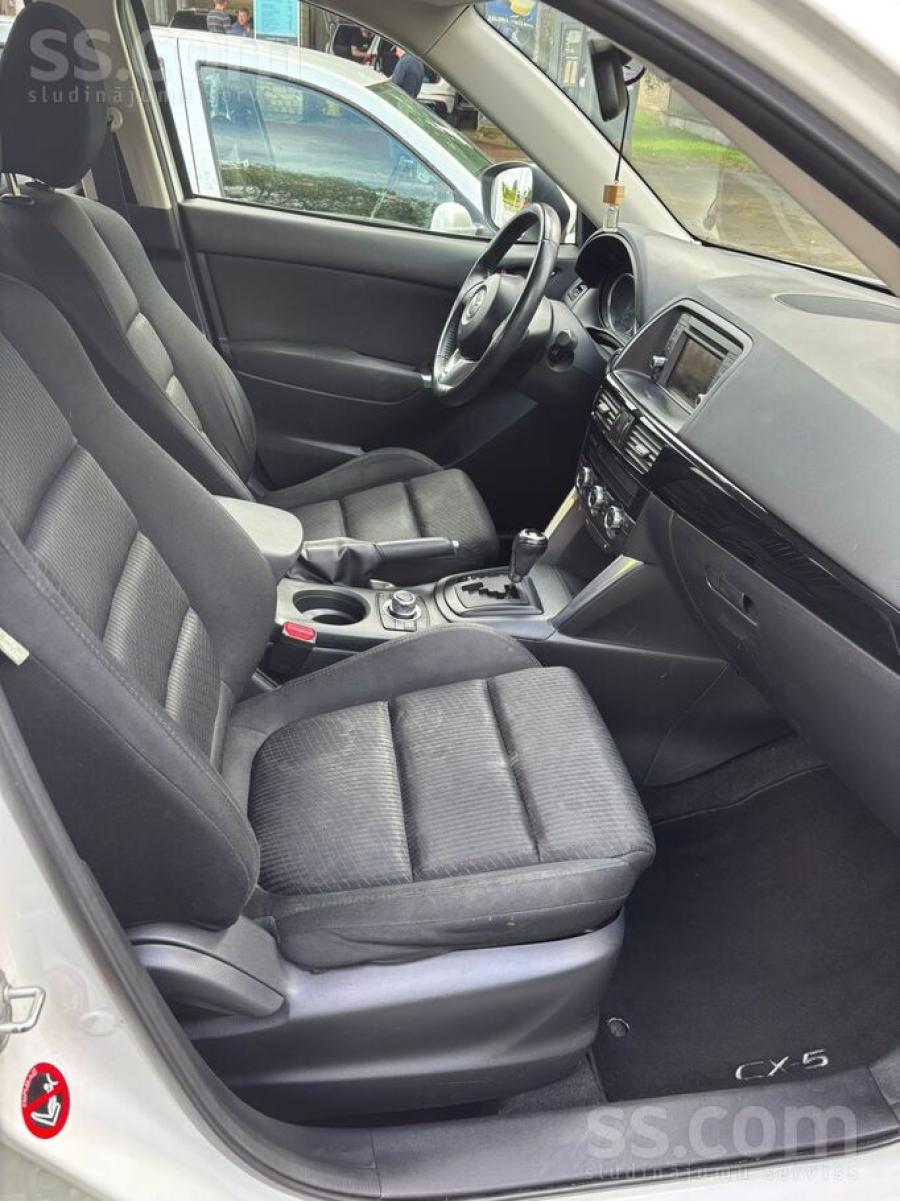 White Mazda CX-5 2013 in Riga, with an engine capacity of 2.00 L and mileage of 177 thousand km for 8600 €, photo 10 on AUTOMOTO.COM.LV