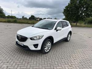Balts Mazda CX-5 2013 Tauragė, ar dzinēja tilpumu 2.19 L un nobraukumu 254 tūkst. km par 5900 €, foto  vietnē AUTOMOTO.COM.LV