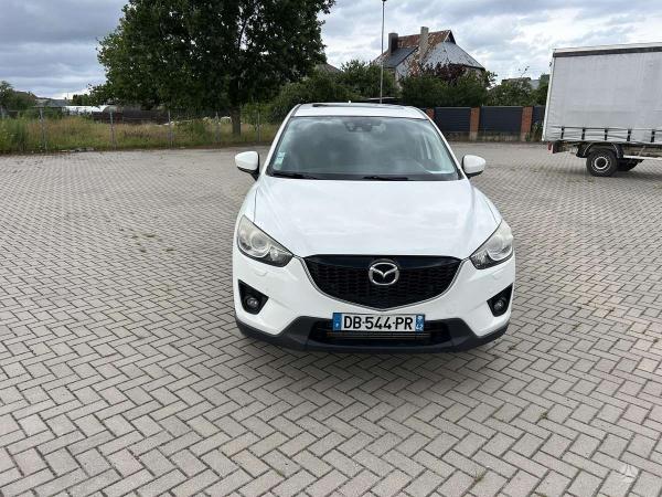 White Mazda CX-5 2013 in Taurage, with an engine capacity of 2.19 L and mileage of 254 thousand km for 5900 €, photo 2 on AUTOMOTO.COM.LV