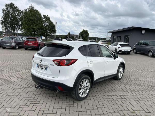 White Mazda CX-5 2013 in Taurage, with an engine capacity of 2.19 L and mileage of 254 thousand km for 5900 €, photo 4 on AUTOMOTO.COM.LV