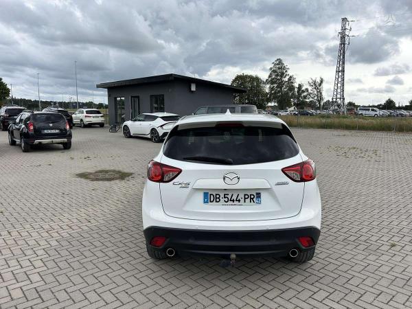White Mazda CX-5 2013 in Taurage, with an engine capacity of 2.19 L and mileage of 254 thousand km for 5900 €, photo 5 on AUTOMOTO.COM.LV