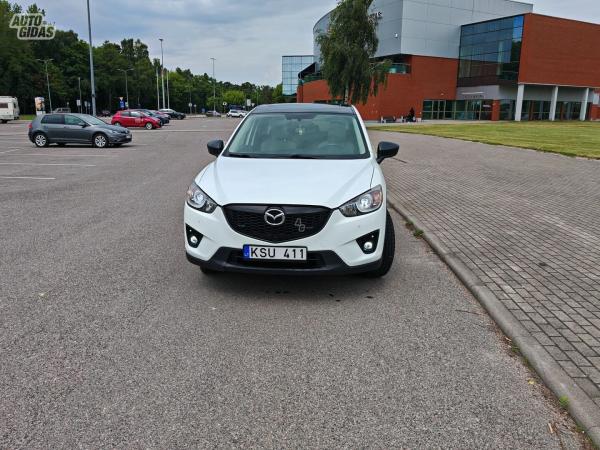White Mazda CX-5 2013 in Klaipeda, with an engine capacity of 2.00 L and mileage of 210 thousand km for 9500 €, photo 2 on AUTOMOTO.COM.LV