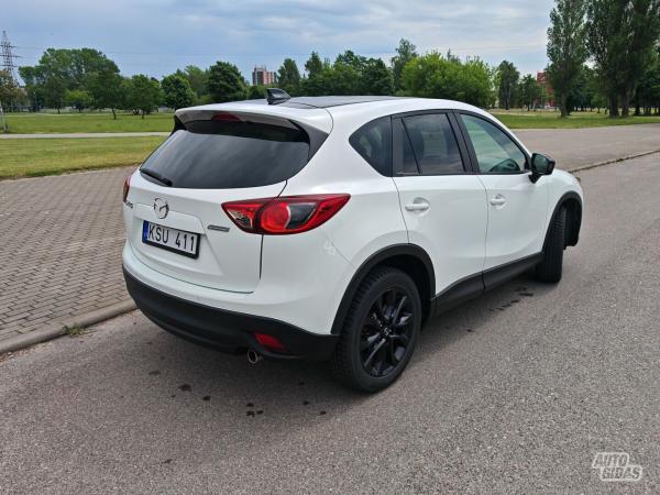 White Mazda CX-5 2013 in Klaipeda, with an engine capacity of 2.00 L and mileage of 210 thousand km for 9500 €, photo 4 on AUTOMOTO.COM.LV