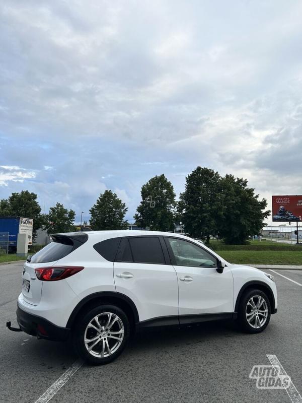 White Mazda CX-5 2013 in Siauliai, with an engine capacity of 2.20 L and mileage of 277 thousand km for 7500 €, photo 4 on AUTOMOTO.COM.LV