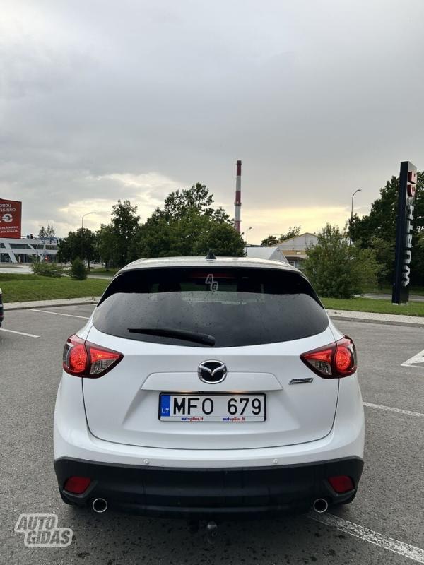 White Mazda CX-5 2013 in Siauliai, with an engine capacity of 2.20 L and mileage of 277 thousand km for 7500 €, photo 6 on AUTOMOTO.COM.LV