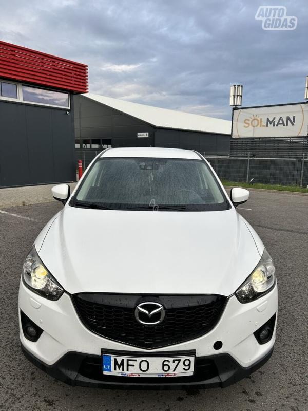 White Mazda CX-5 2013 in Siauliai, with an engine capacity of 2.20 L and mileage of 277 thousand km for 7500 €, photo 8 on AUTOMOTO.COM.LV
