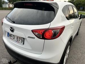 Balts Mazda CX-5 2013 Šauļi, ar dzinēja tilpumu 2.20 L un nobraukumu 277 tūkst. km par 7500 €, foto 13 vietnē AUTOMOTO.COM.LV